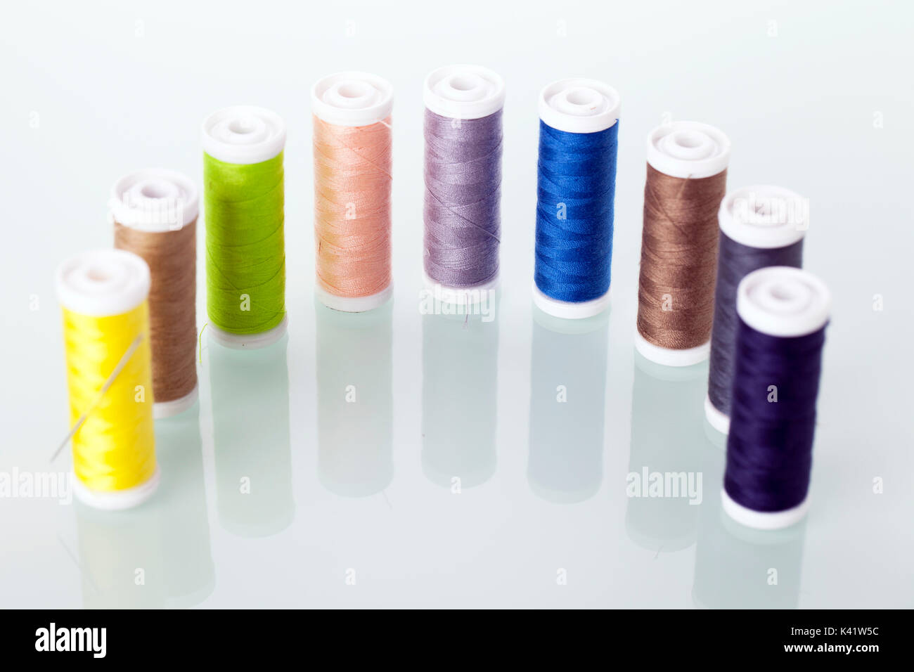 Sewing threads isolated on white background. Studio Shot Stock Photo ...