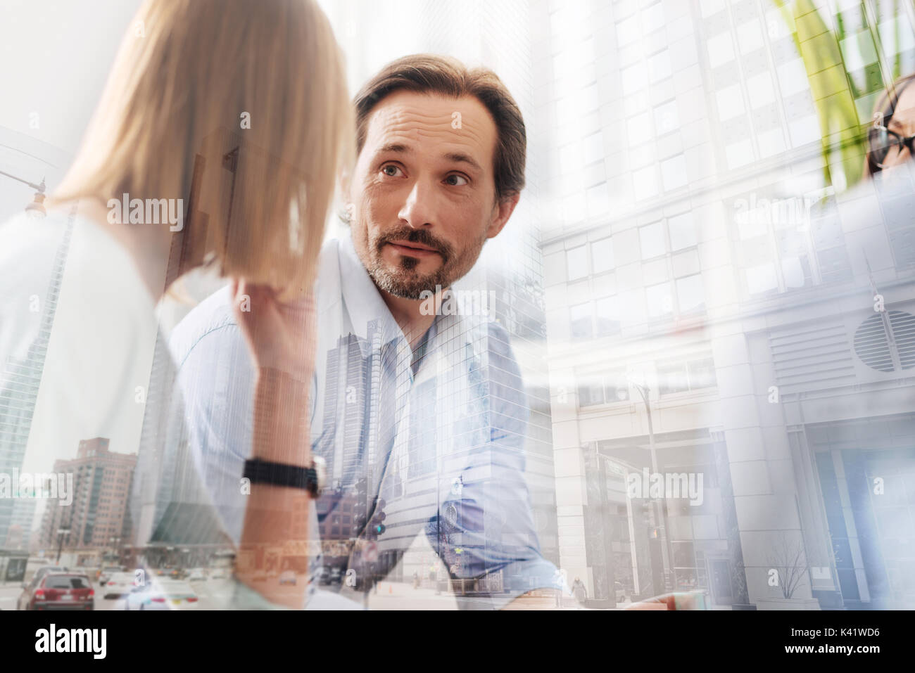 Professional businesspeople having a group discussion Stock Photo - Alamy