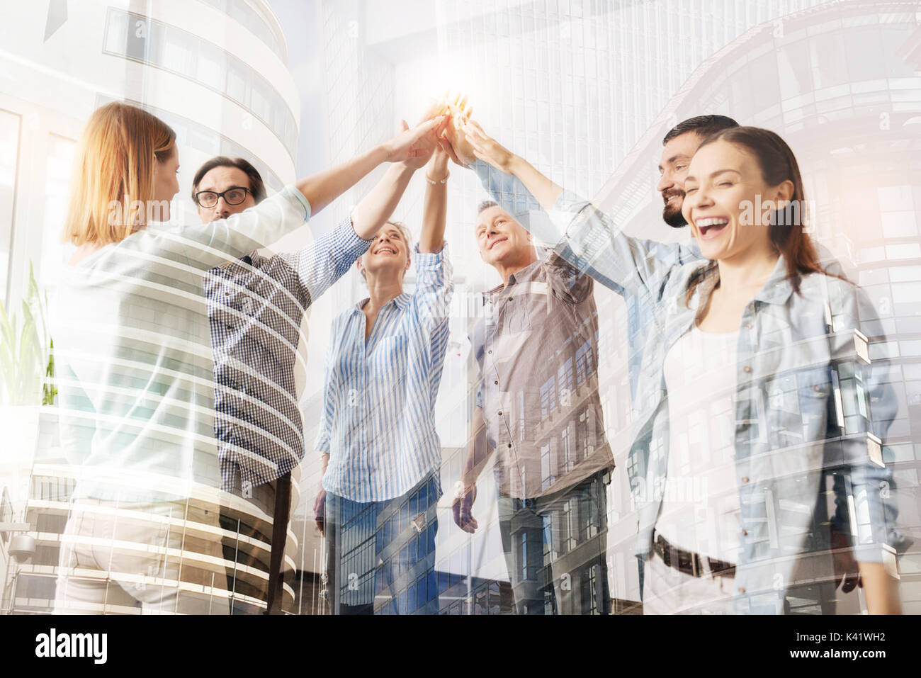 Cheerful office workers enjoying team building activities Stock Photo ...