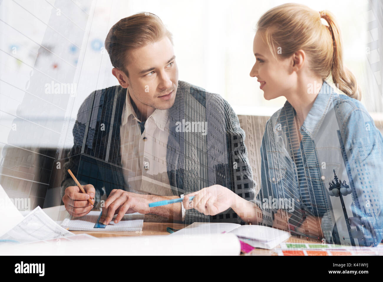 Professional engineers working together in the office Stock Photo - Alamy