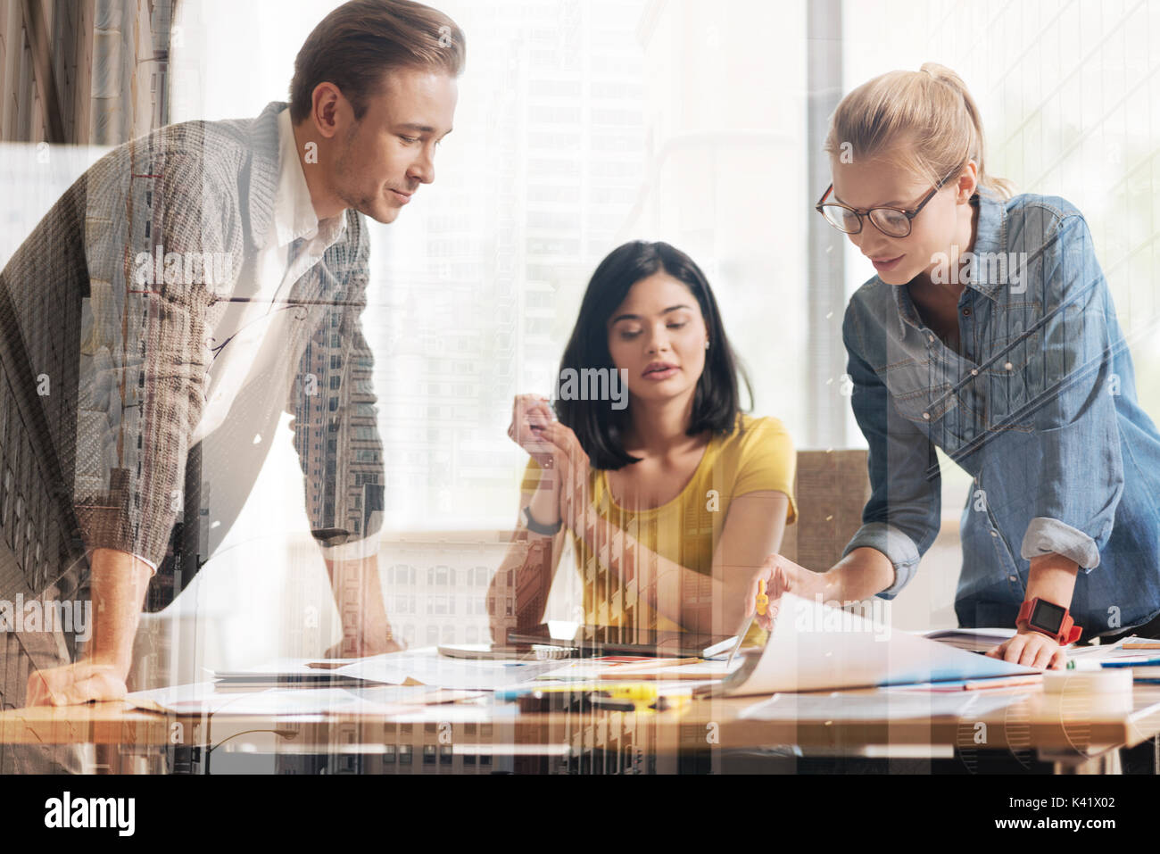 Professional engineers working in one team Stock Photo - Alamy