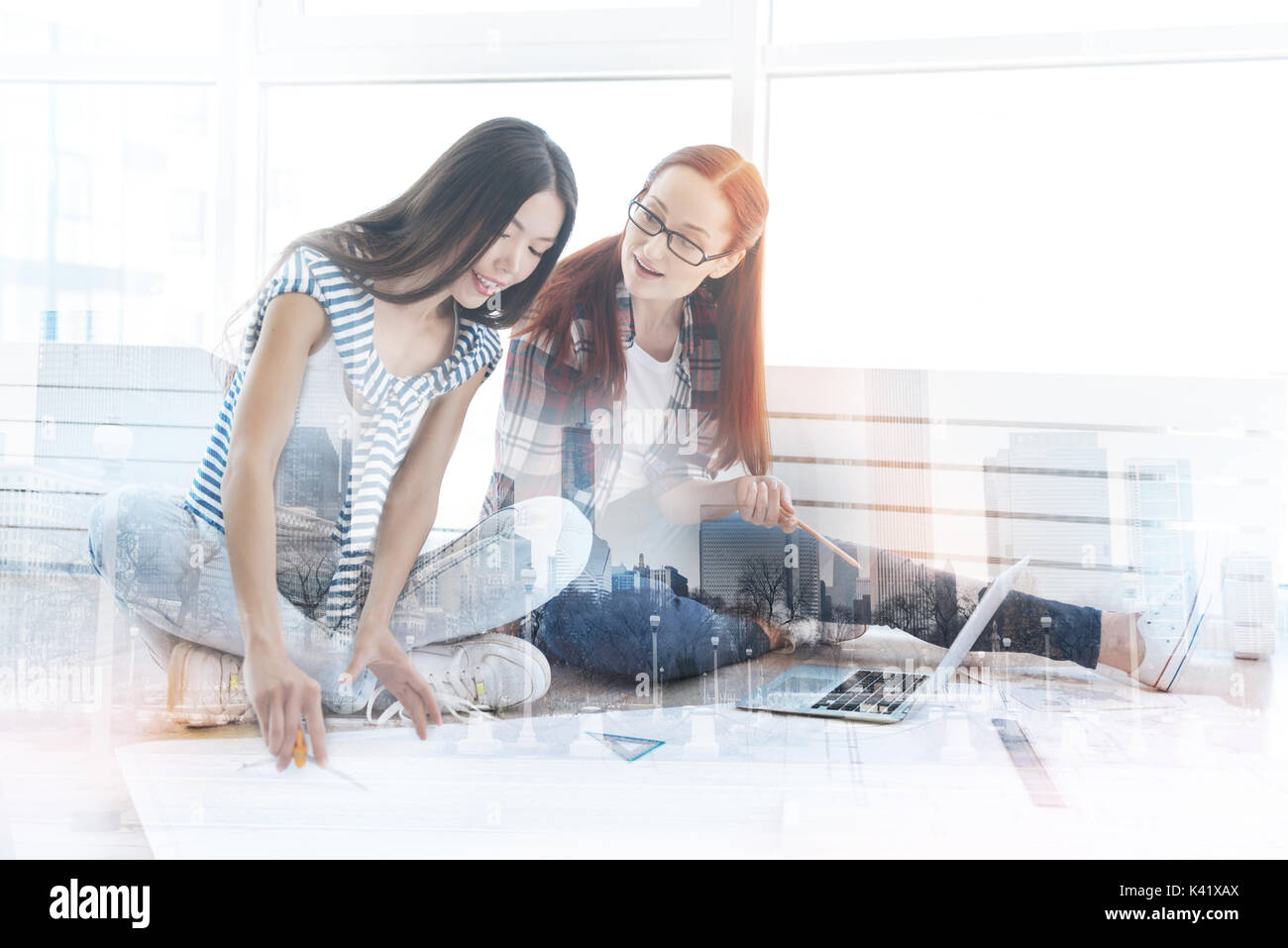 Typical working day of two designers in their office Stock Photo - Alamy