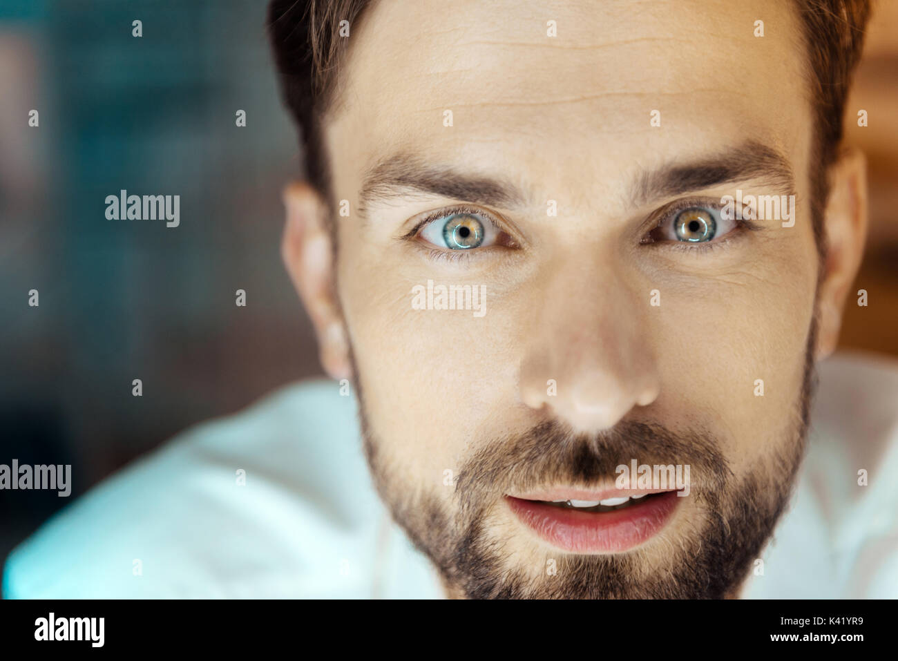 Portrait of delighted man that looking forward Stock Photo - Alamy