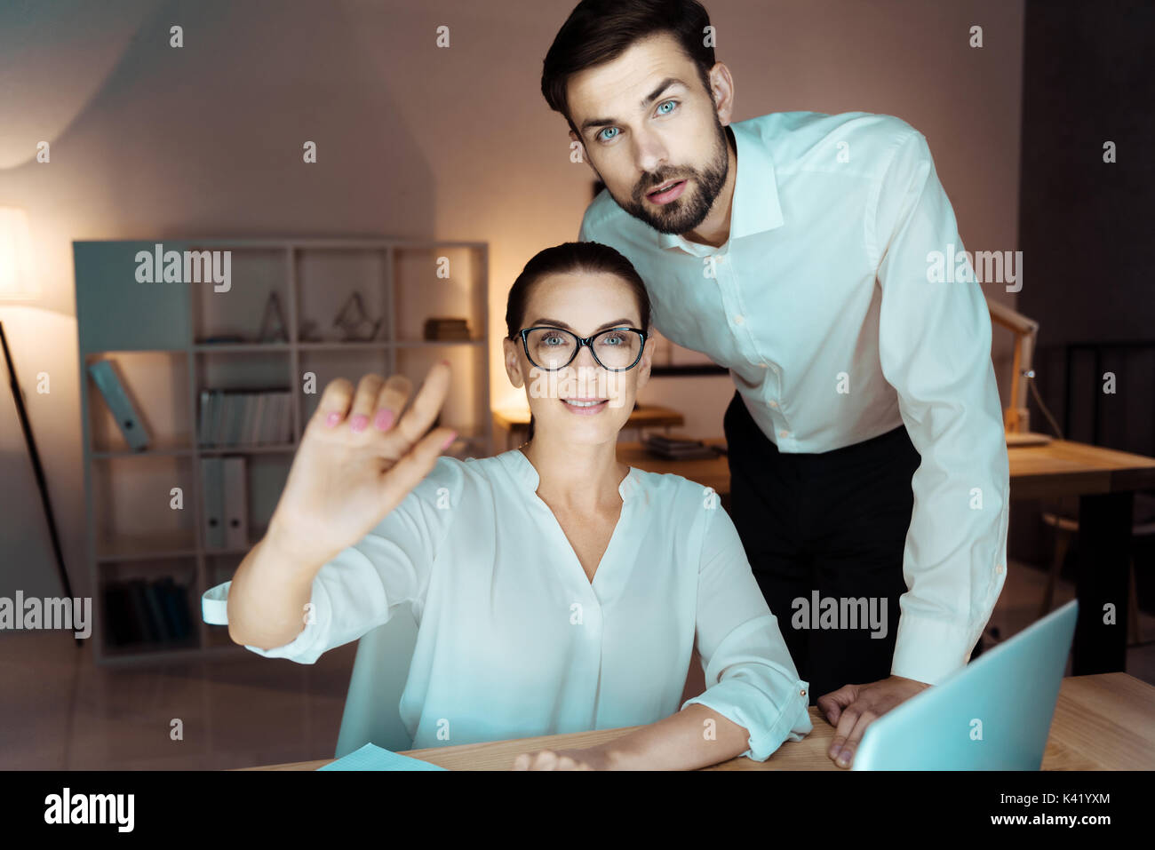 Delighted partners posing together on camera Stock Photo - Alamy