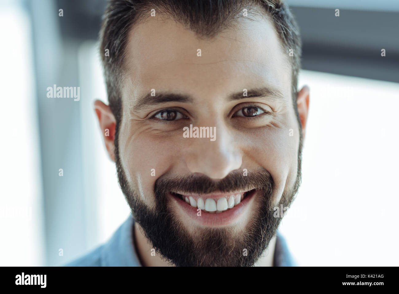 Bearded man smiling hi-res stock photography and images - Alamy