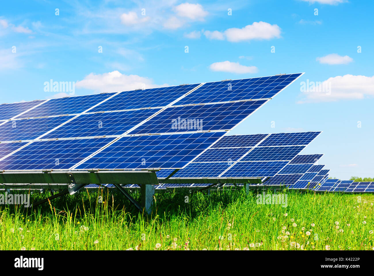 Solar panel on blue sky background Stock Photo - Alamy