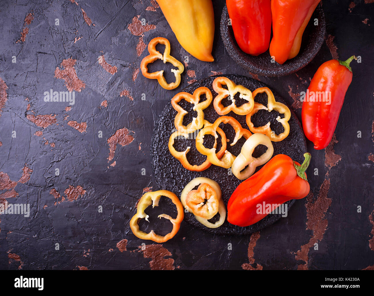 Sweet bulgarian pepper on dark rusty background Stock Photo - Alamy