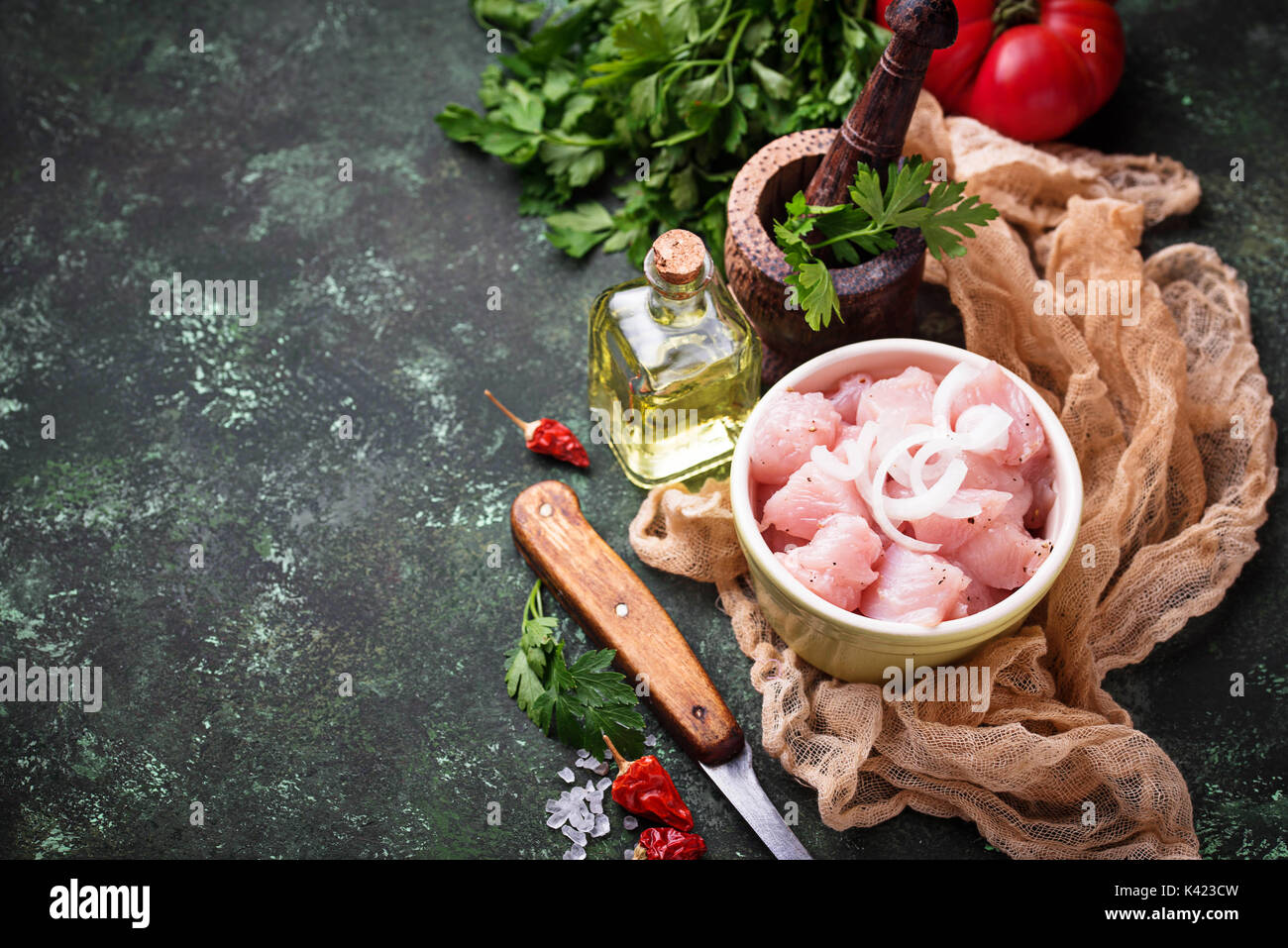 Raw sliced chicken meat ready for cooking Stock Photo - Alamy