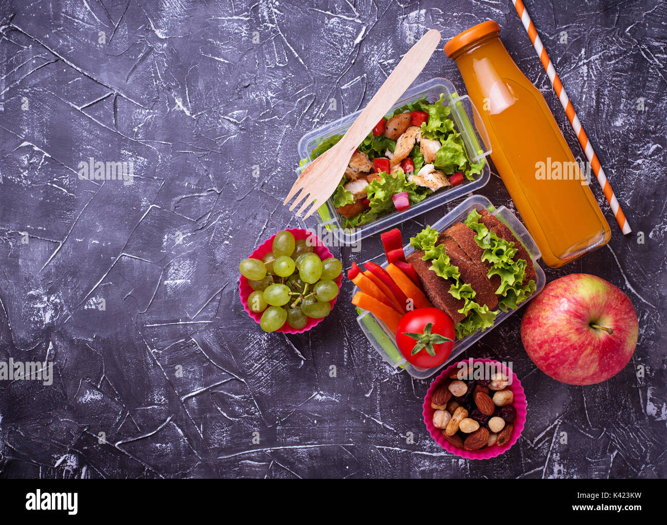 School lunch. Salad, sandwiches, fruits and nuts Stock Photo - Alamy
