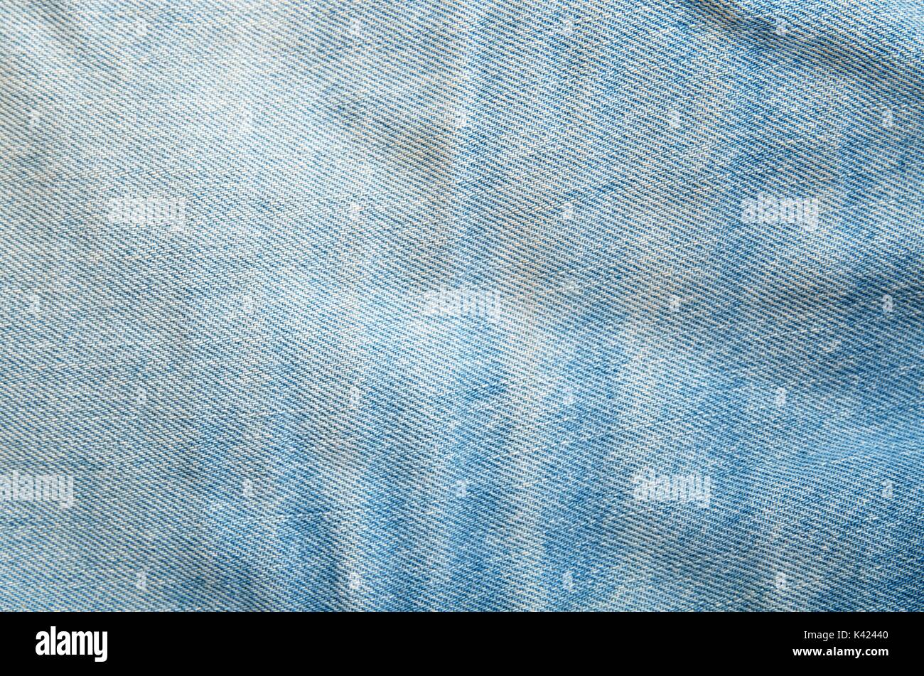 texture formed by the first plane of the fabric of an old pair of jeans ...