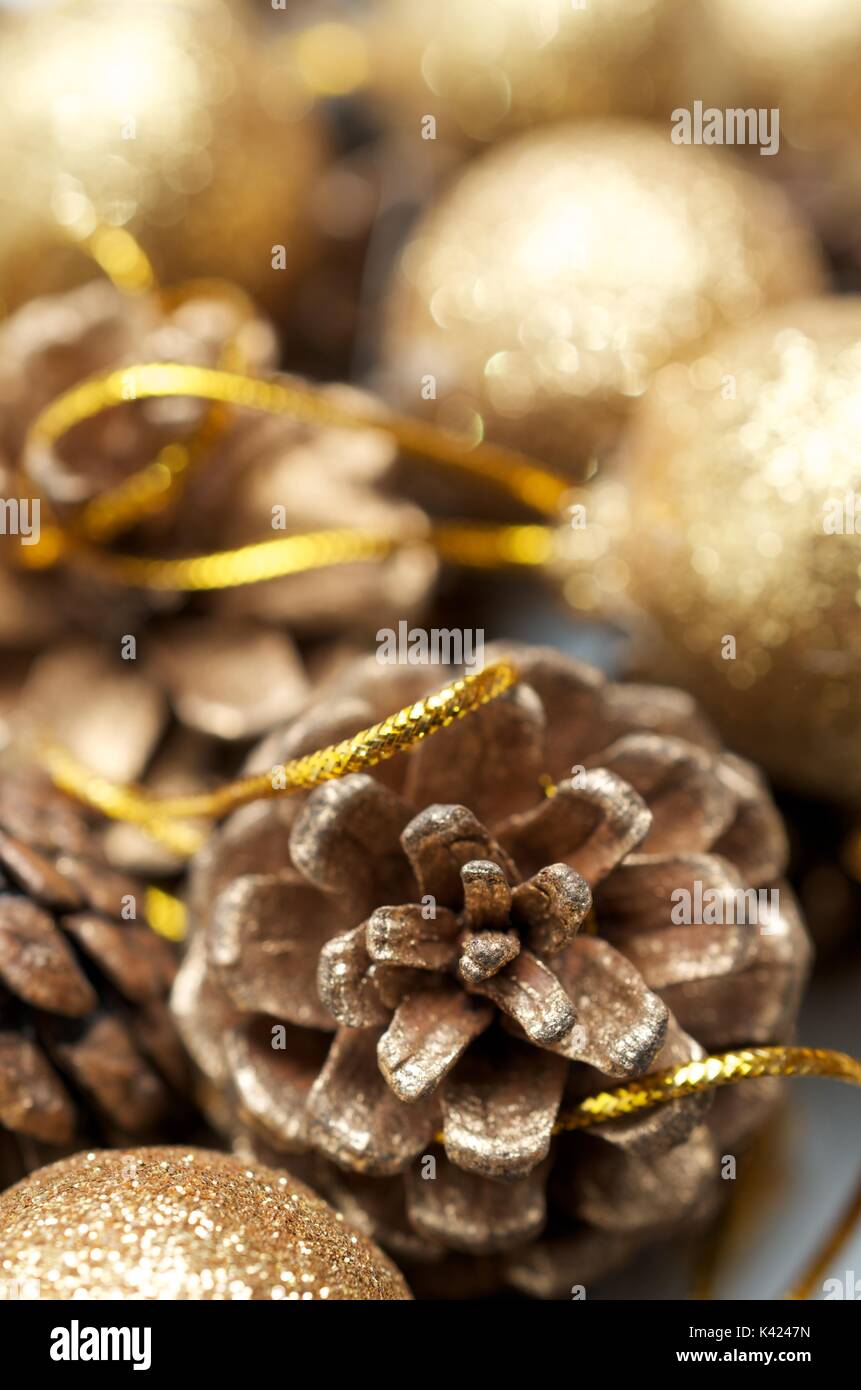group ball Christmas ornaments and pine cones Stock Photo - Alamy