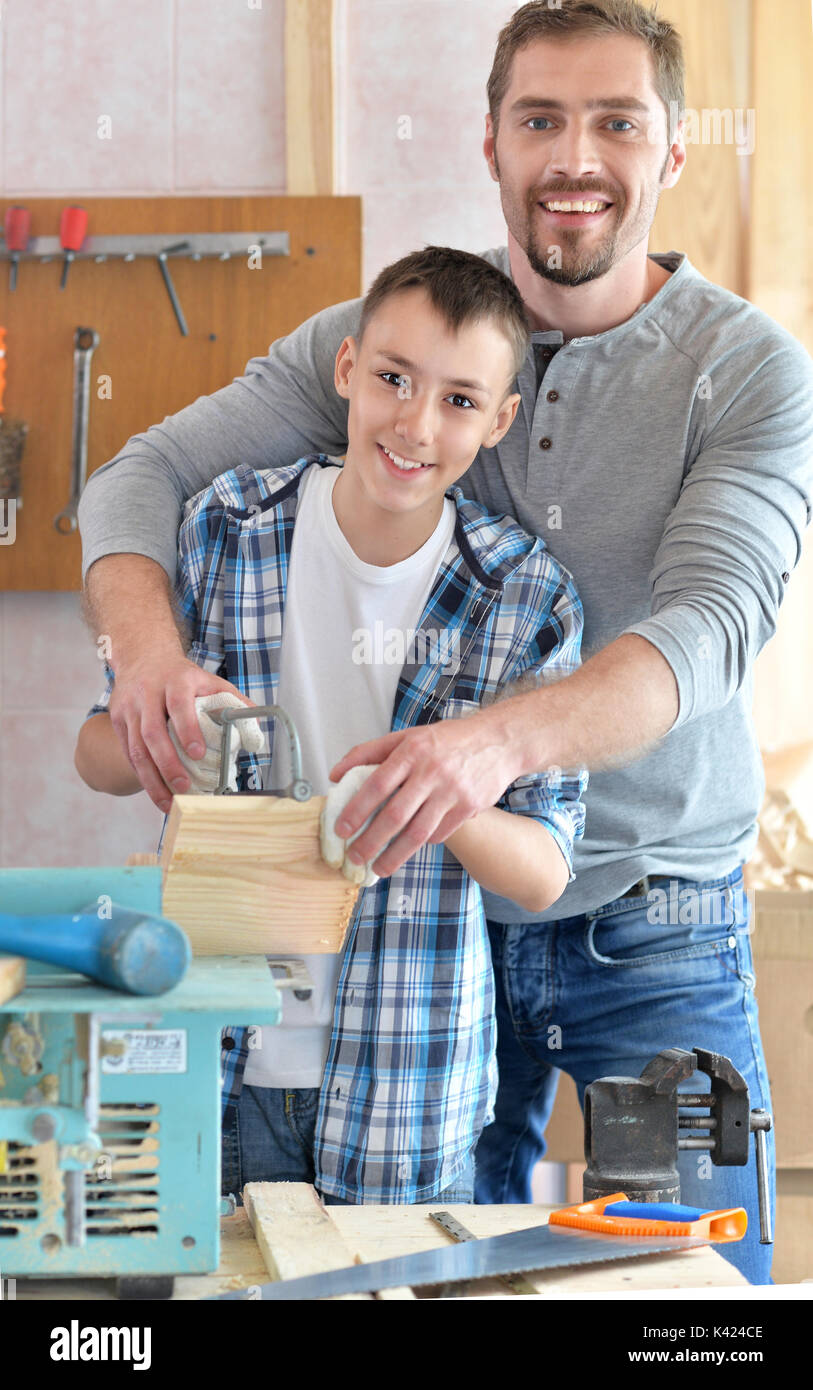 father and son in carpentry workshop Stock Photo - Alamy
