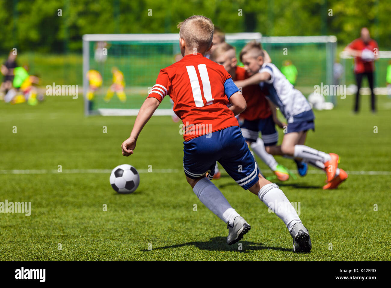 Football Soccer Match for Children. Kids Playing Soccer Game Tournament ...