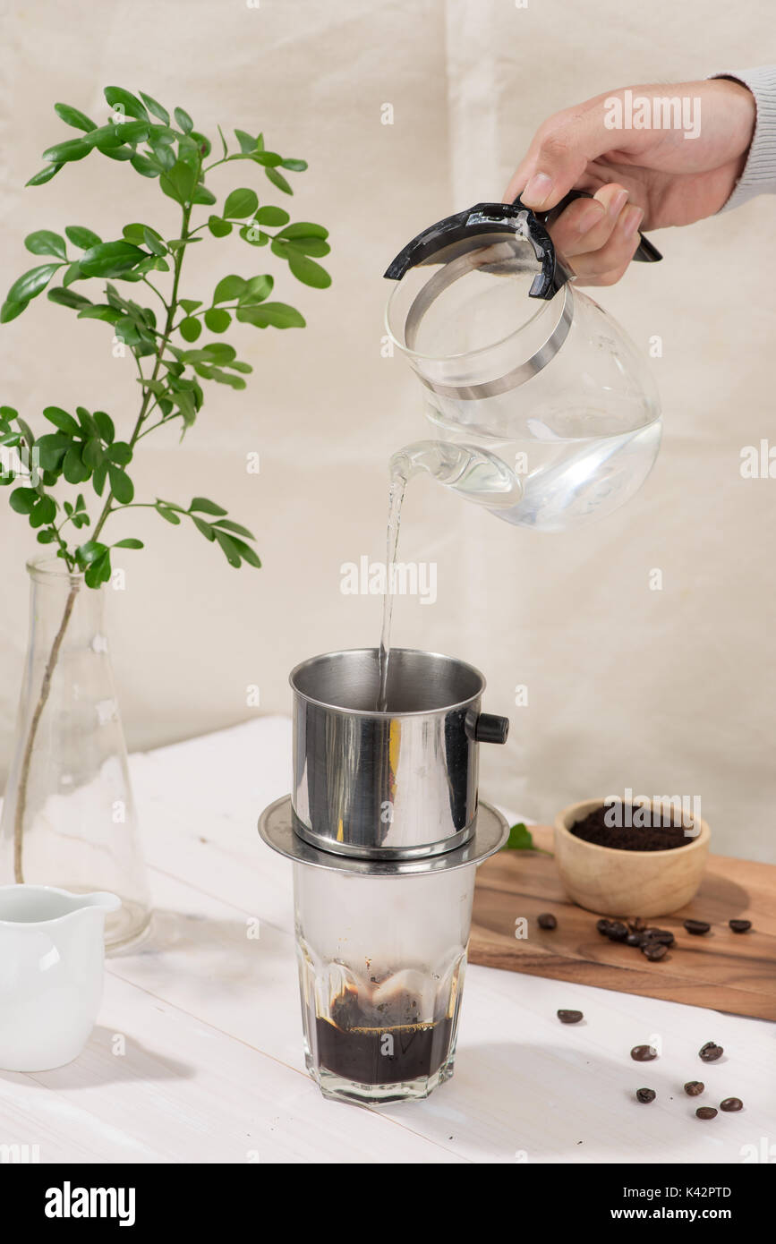 Dripping coffee with white cup hi-res stock photography and images - Alamy