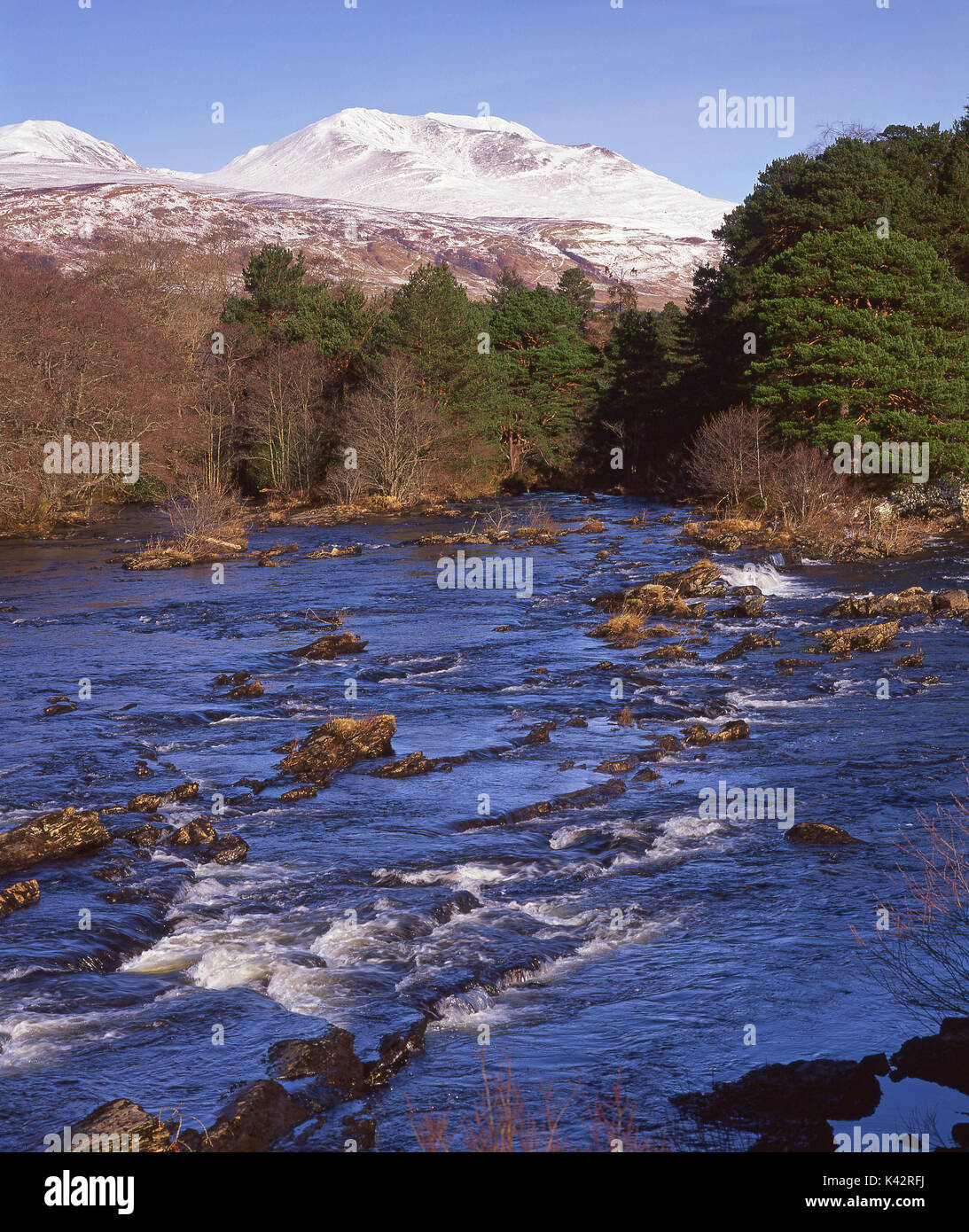 A snow capped Ben Lawers as seen from across the River Dochart, Killin ...