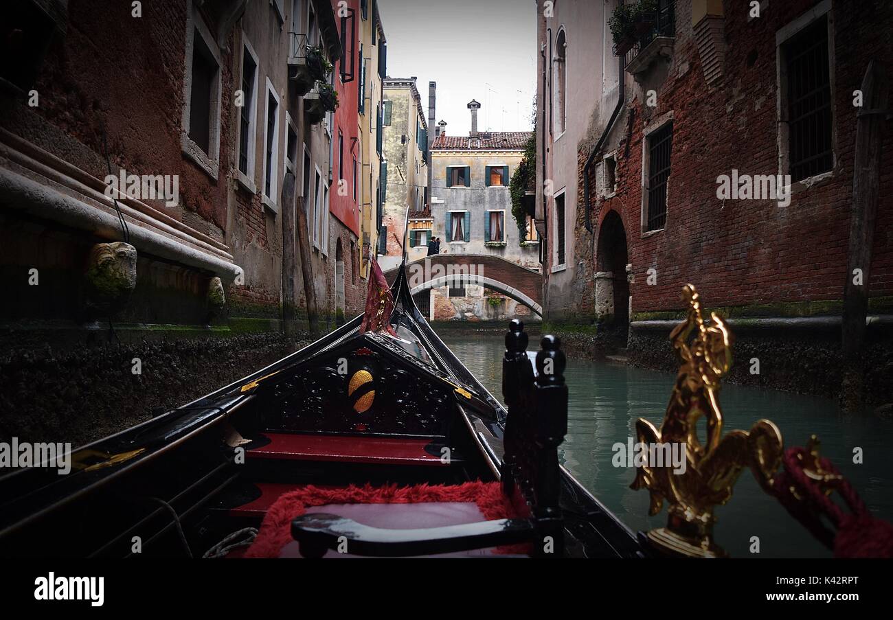 Shot from a gondola boat ride through the streets (canals) and under ...