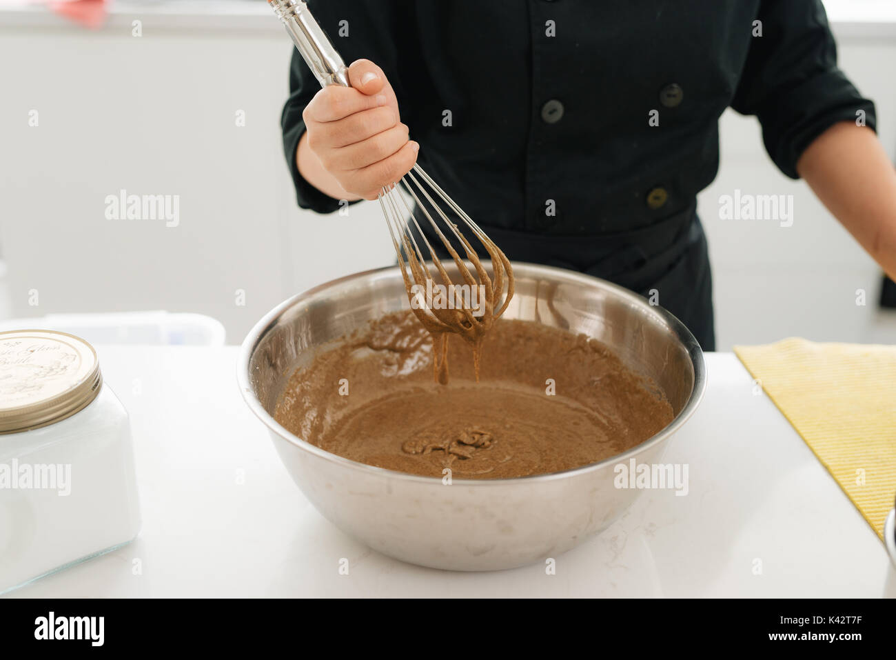 Bakery chef cooking bake in the kitchen professional Stock Photo - Alamy
