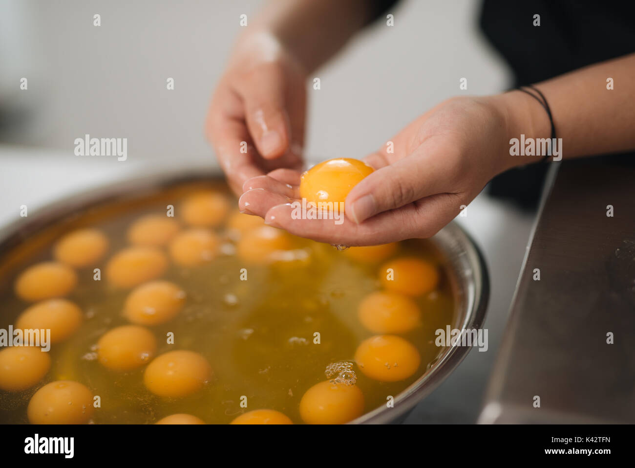 Bakery chef cooking bake in the kitchen professional Stock Photo - Alamy
