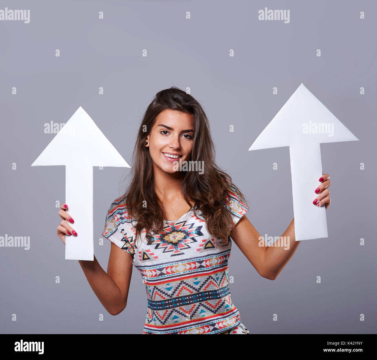 Woman holding signs hi-res stock photography and images - Alamy