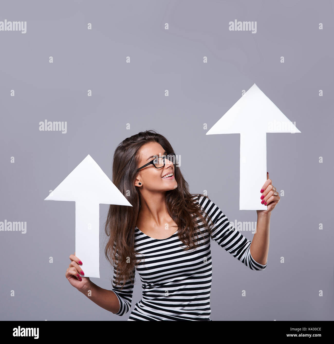 Arrow signs show the upper direction Stock Photo - Alamy
