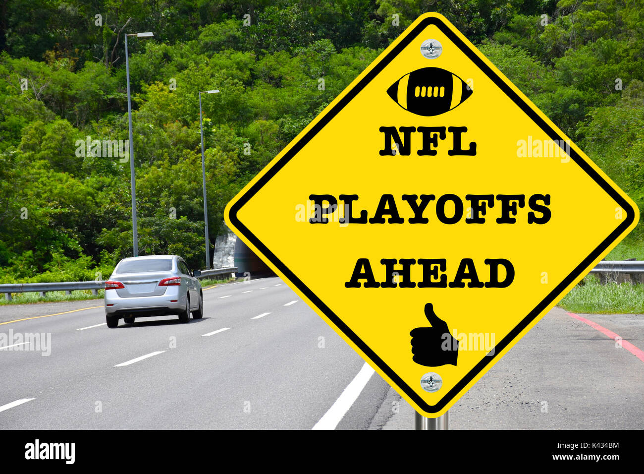 NFL playoffs ahead, yellow warning road sign Stock Photo - Alamy