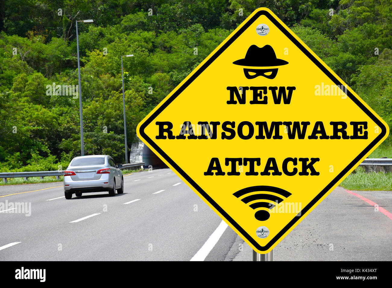 New ransom ware attack, yellow warning sign Stock Photo - Alamy