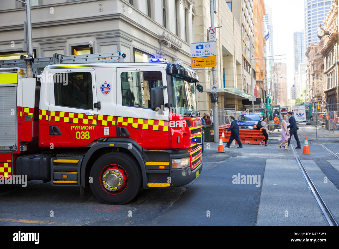 Fire and Rescue NSW fire engine truck tender driving through Sydney ...