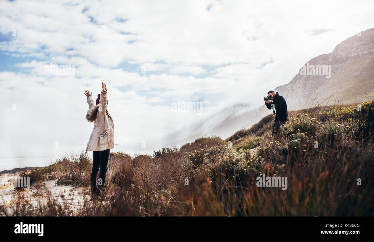 Man photographing his girlfriend hi-res stock photography and images ...