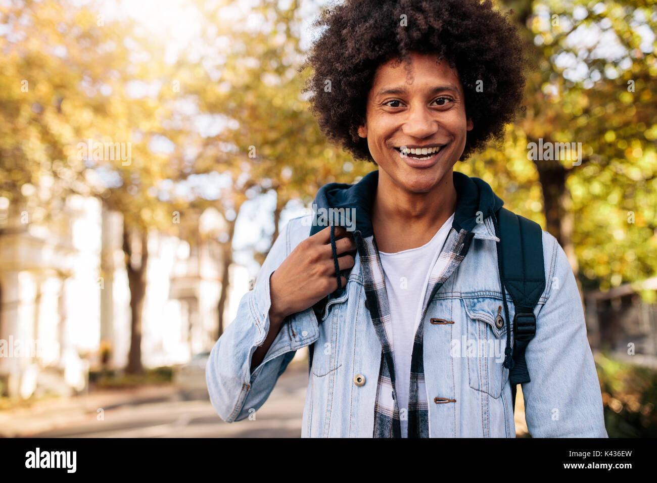 Young man with backpack going to school college. university student ...
