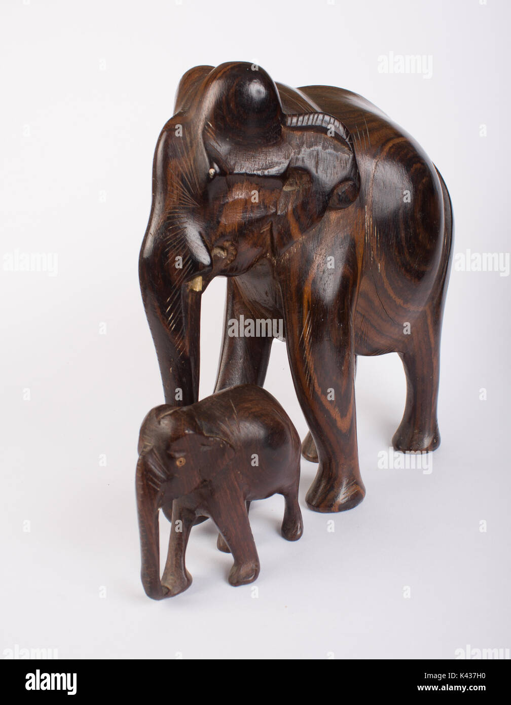 Wooden Elephants Isolated on White Stock Photo - Alamy