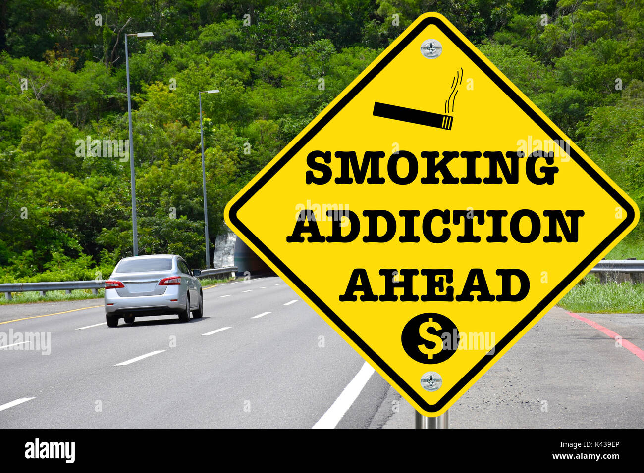 Smoking addiction ahead, yellow warning street sign Stock Photo - Alamy