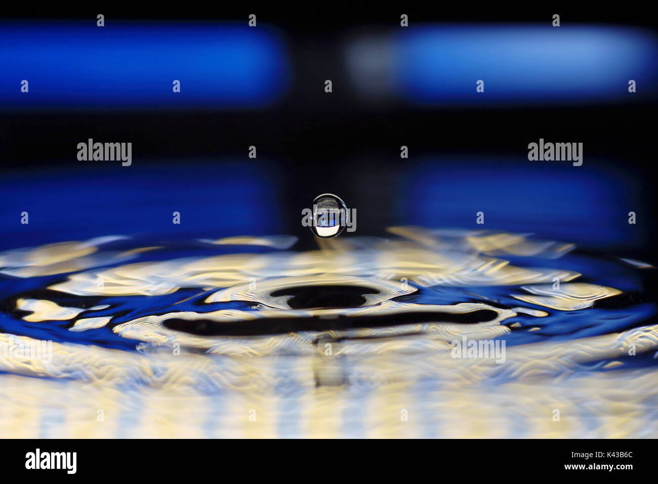 Falling into water droplets Stock Photo - Alamy