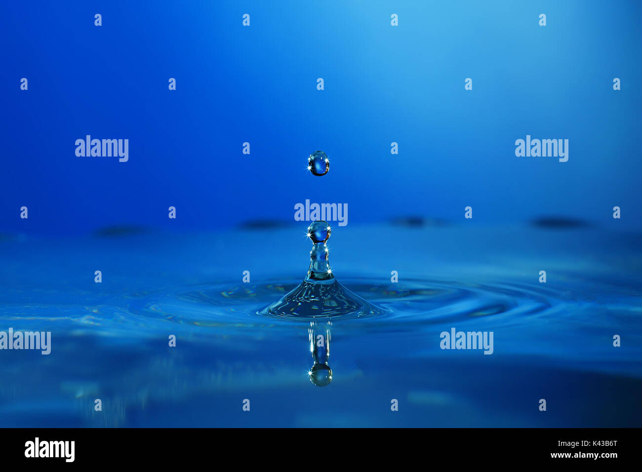 Falling into water droplets Stock Photo - Alamy