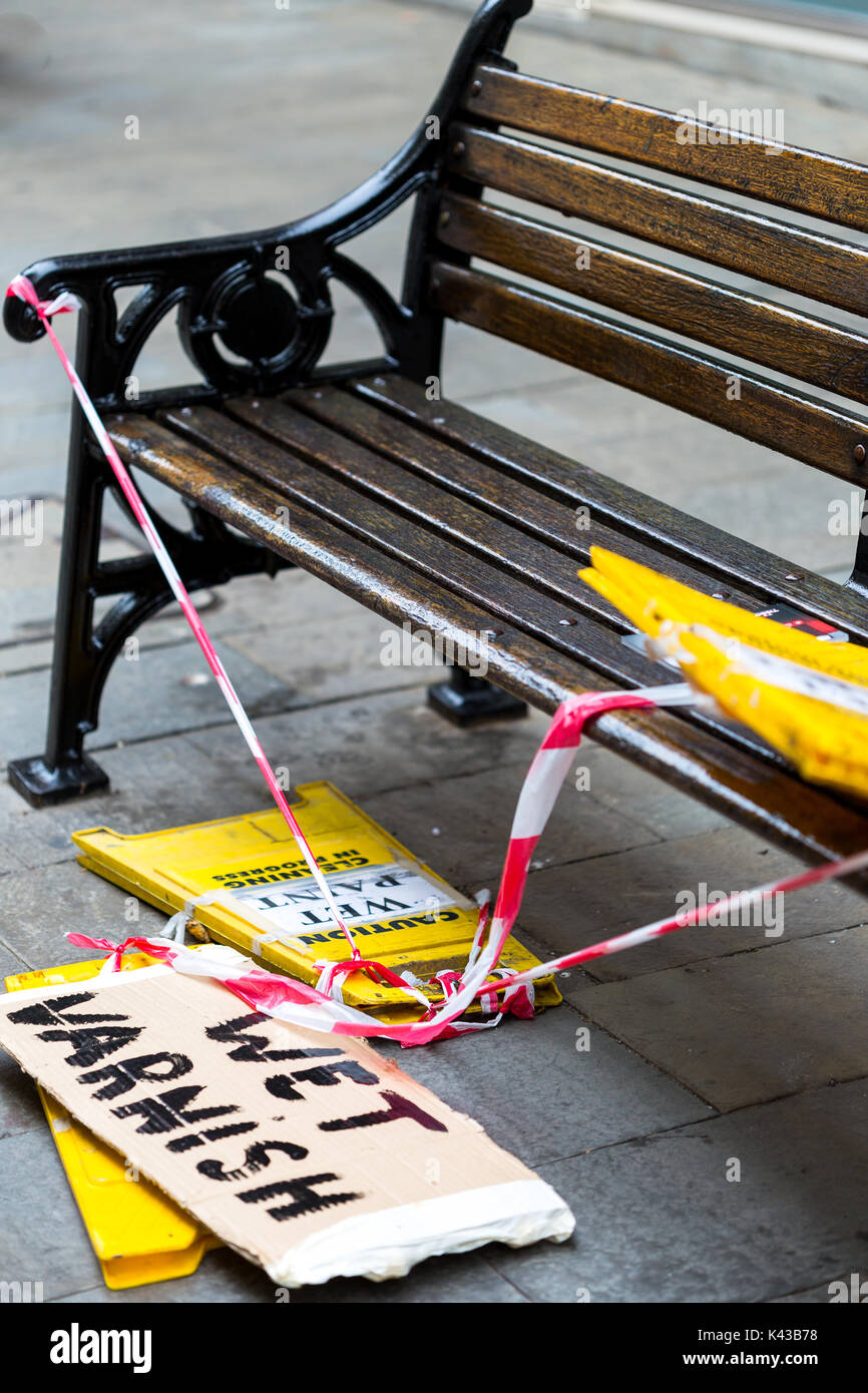Warning signs for bench seat freshly varnished. Gibraltar Stock Photo ...
