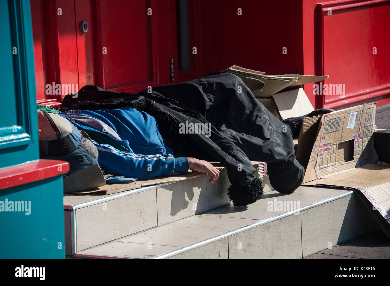 Rough sleepers taking shelter in a doorway in Brighton city centre ...