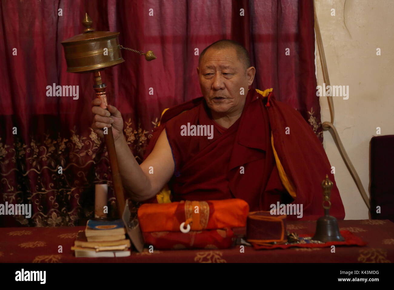 Lama Namka conducts morning puja ceremonies at Dorje Ling Buddhist ...
