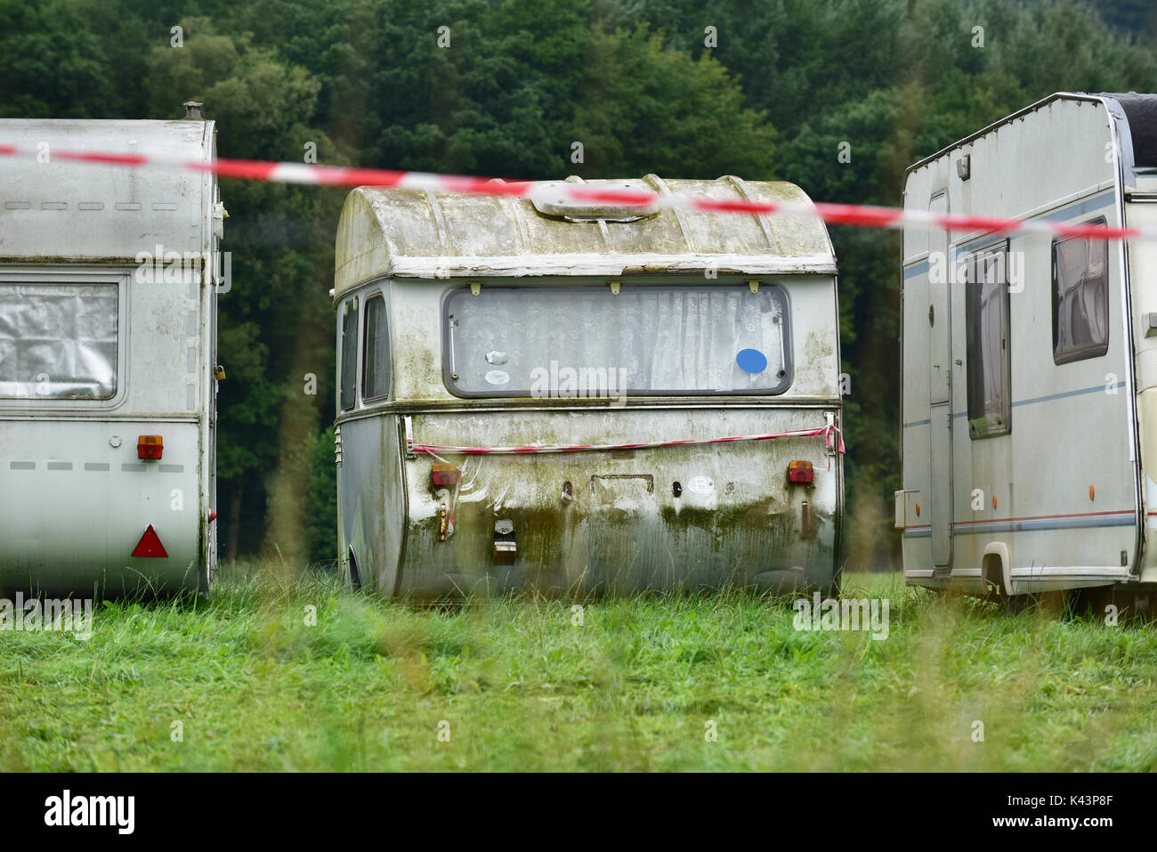 Decrepit caravan on a travel trailer parking in the Belgian Ardennes Stock Photo - Alamy