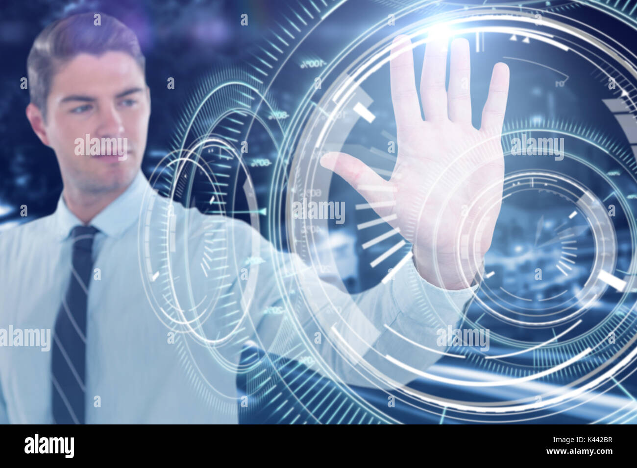 Businessman using futuristic digital screen against interface dial with ...