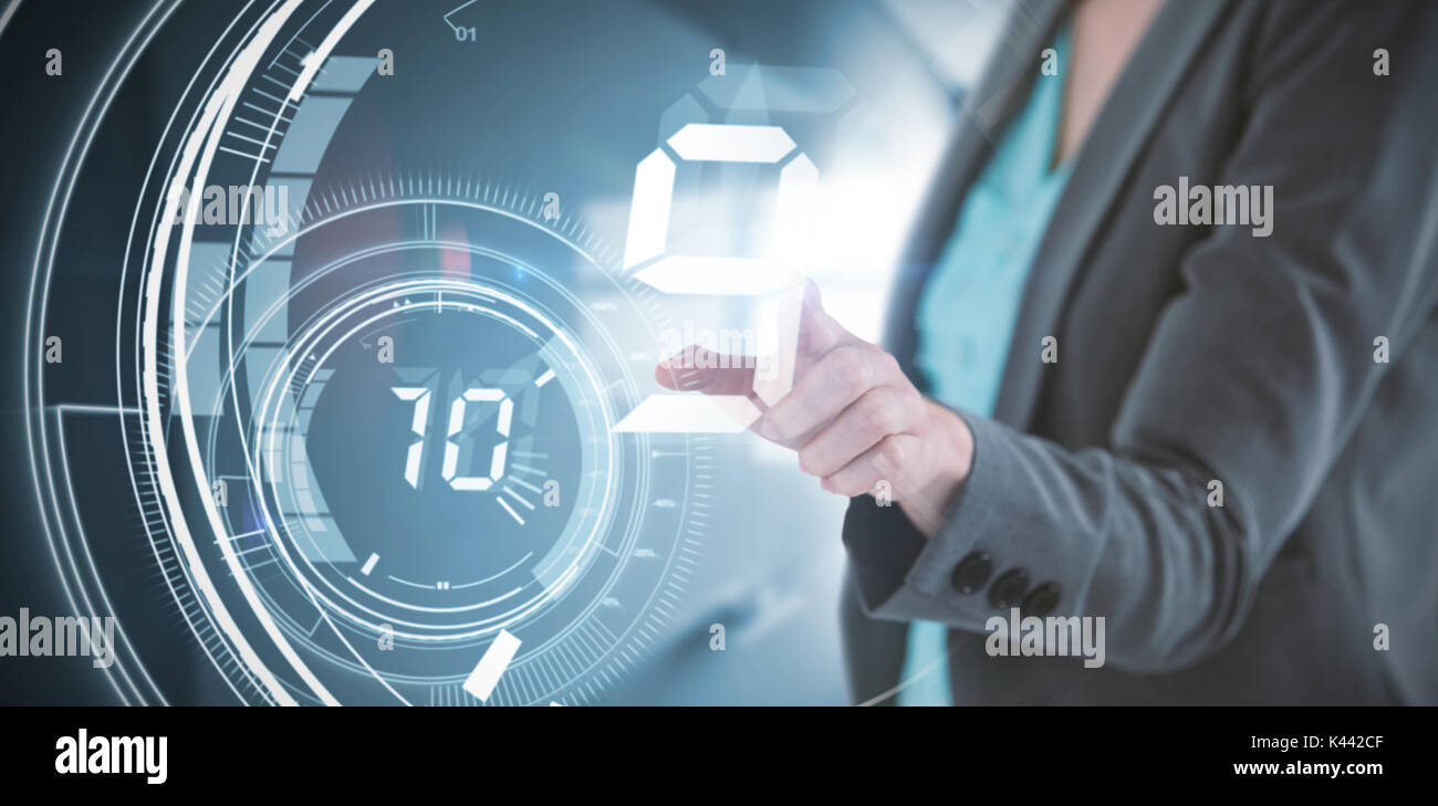Businesswoman touching invisible digital screen against interface dial ...