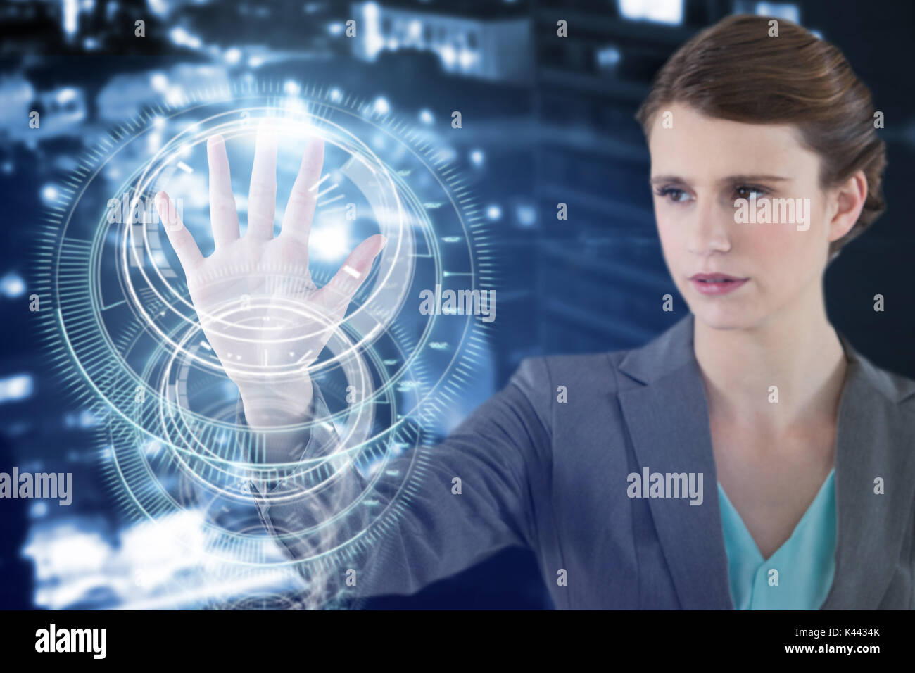 Businesswoman touching digital screen against multiple interface dial ...