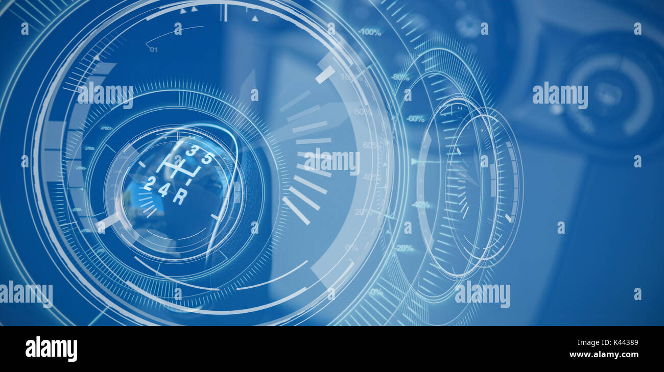 Interface dial with blue background against close-up of gear in car ...