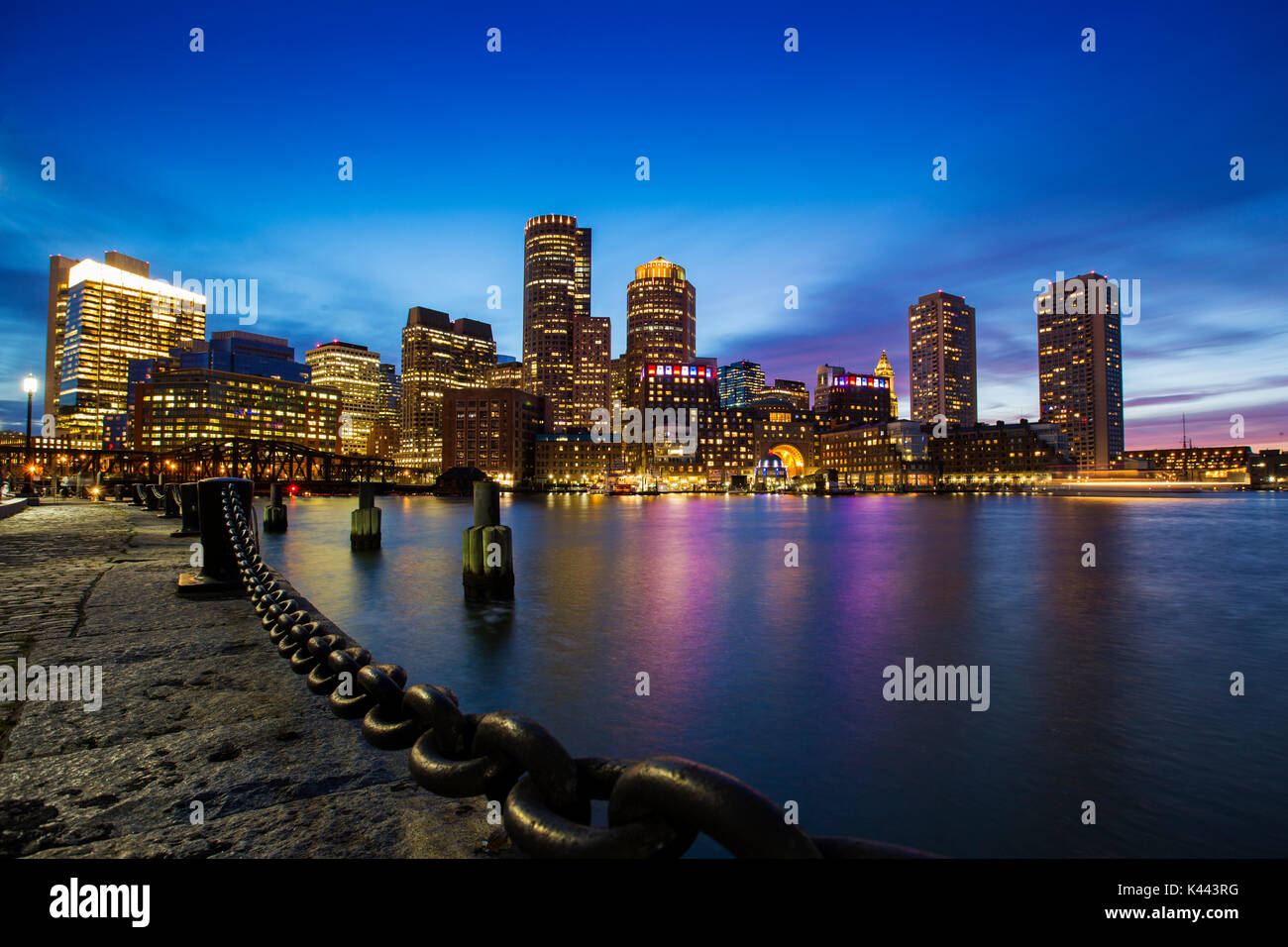 Boston Skyline from Downtown Harborwalk at dusk Stock Photo - Alamy