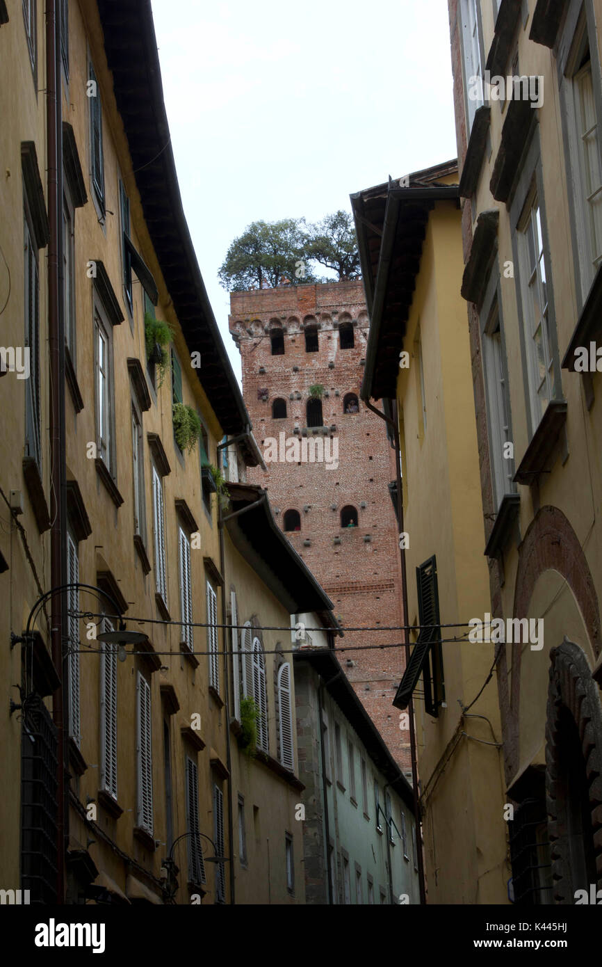 LUCCA, ITALY - AUGUST 15 2015:Old buildings in Lucca with the famous ...
