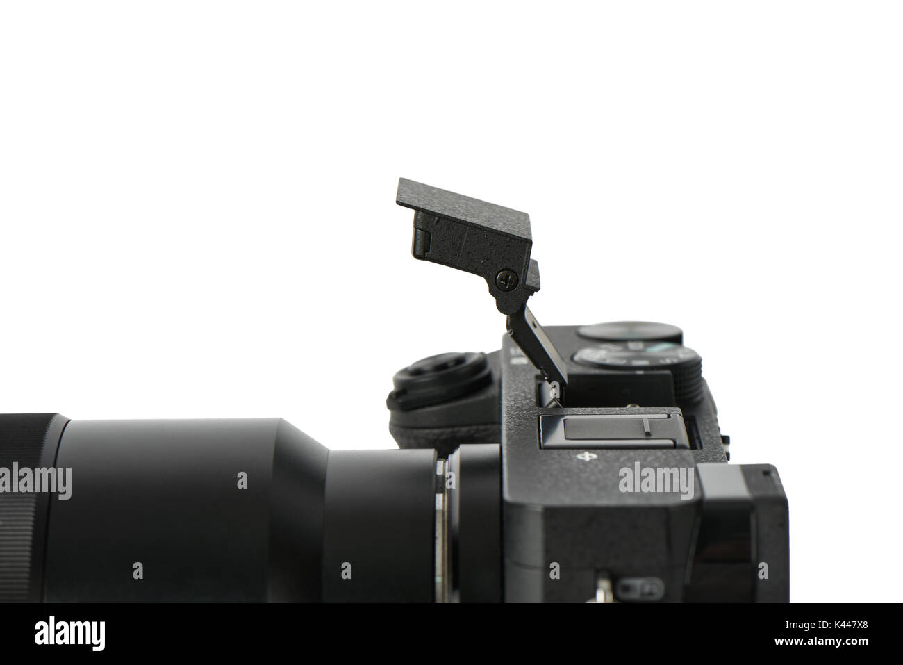 Closeup of pop-up flash on a mirrorless interchangeable lens camera ...