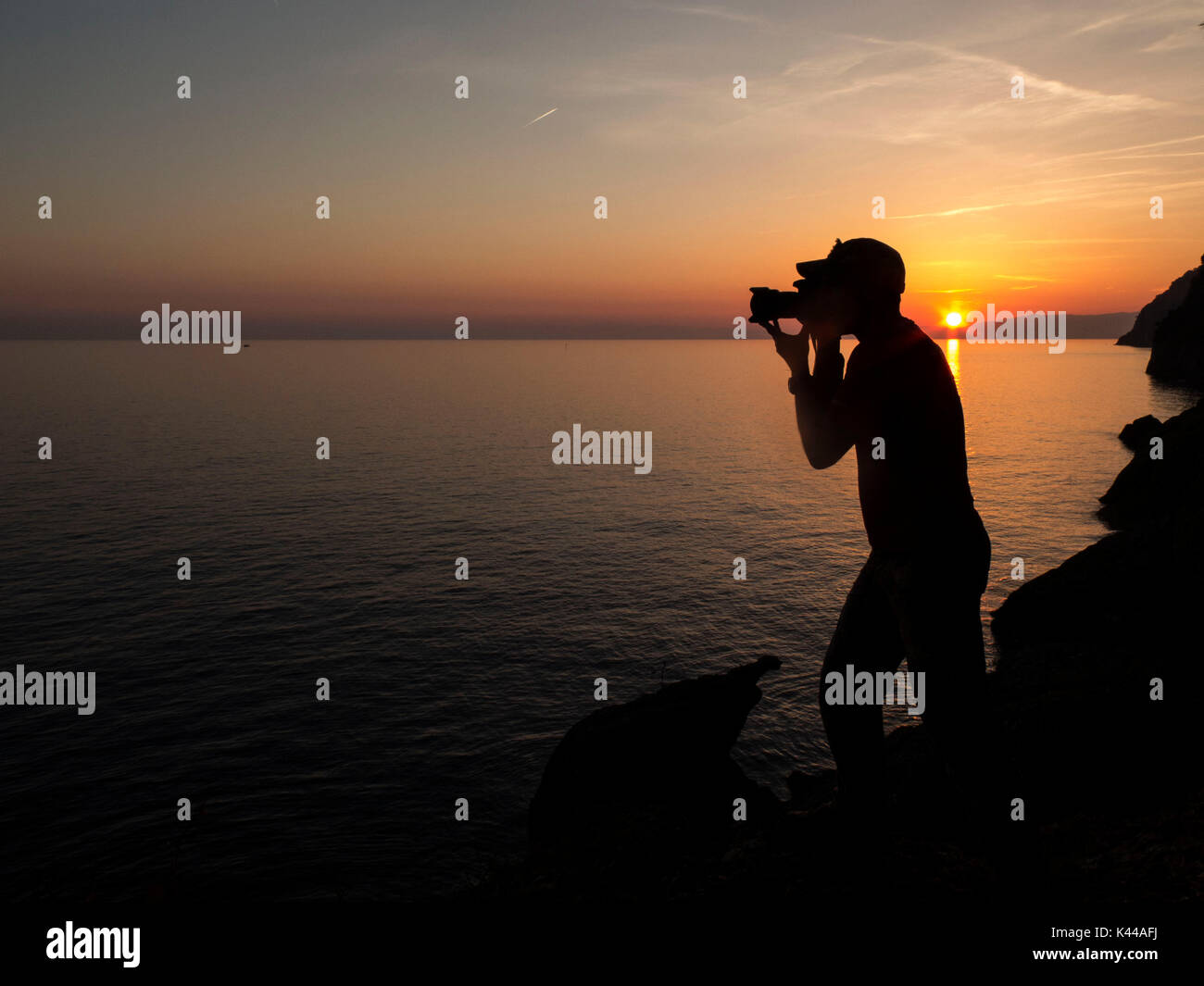 Photographer at sunset in backlight hi-res stock photography and images ...