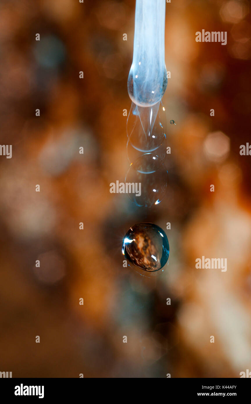 Falling drop on an abandoned mine Stock Photo - Alamy