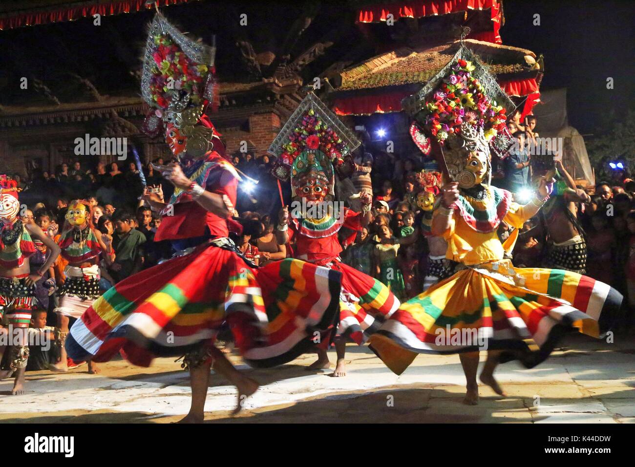 Kathmandu, Nepal. 4th Sep, 2017. Masked dancers perform in celebration ...