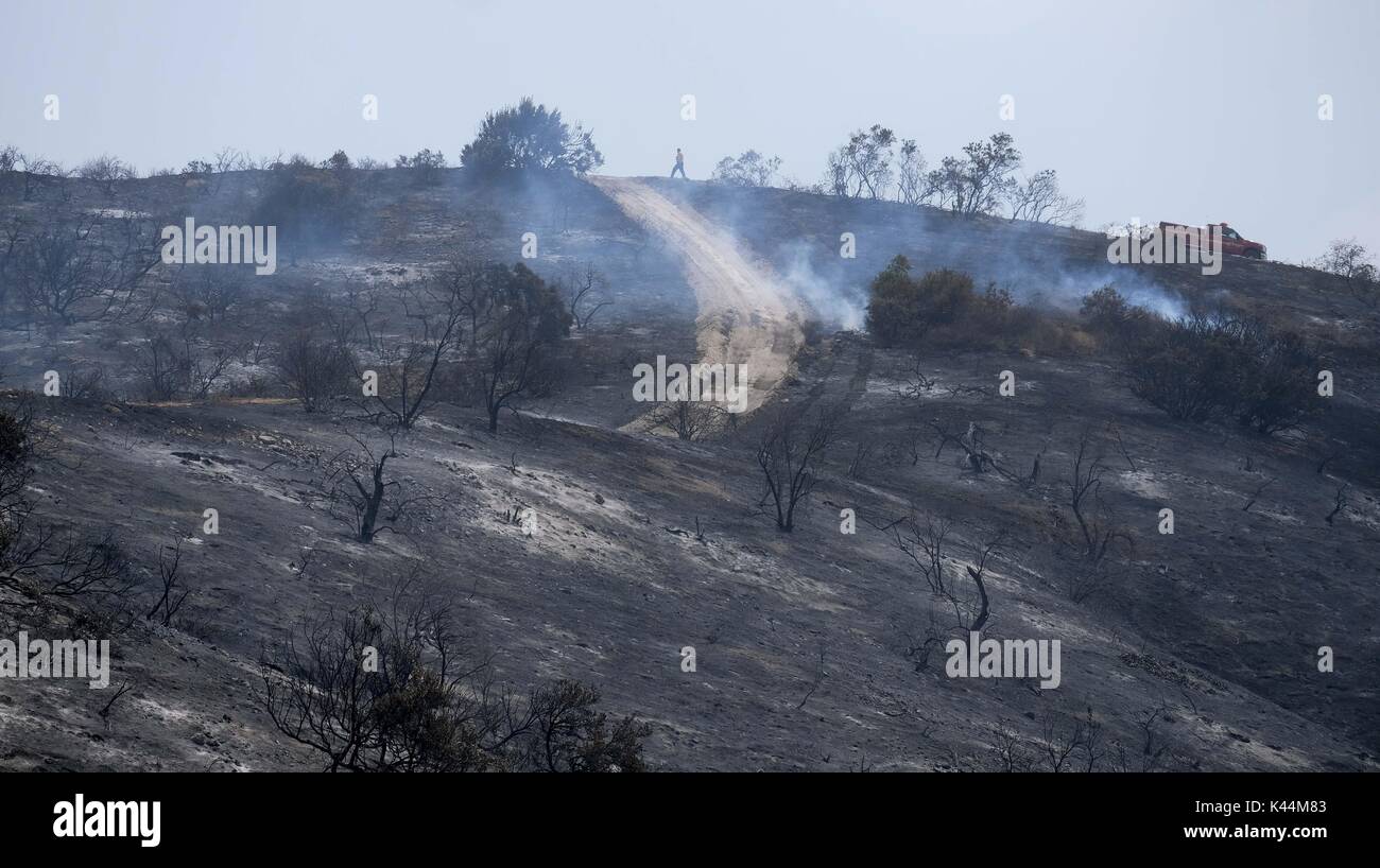 Los Angeles, California, USA. 4th Sep, 2017. A fire truck drives by the ...