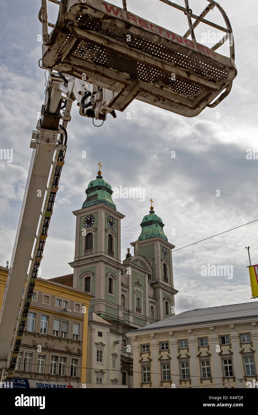 A street scene from the city of Linz, Czechoslovakia featuring crews ...