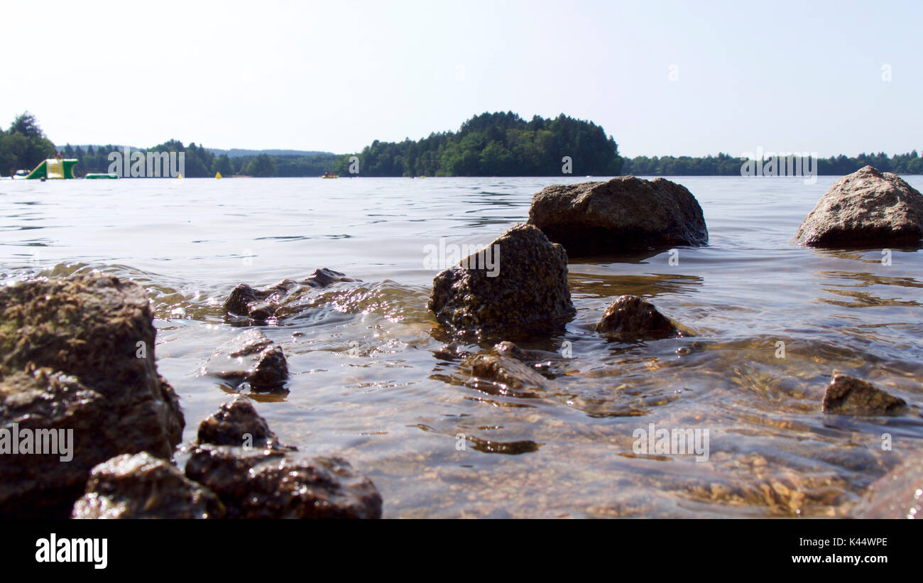 Lakeside on a hot summer day, France Stock Photo - Alamy
